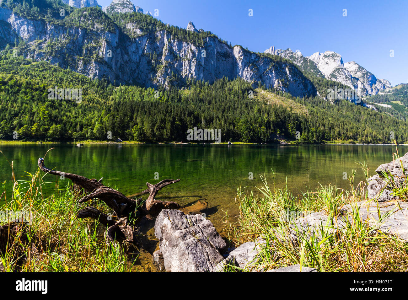 Fantastic azure alpine lake Vorderer Gosausee. Unusual and picturesque ...