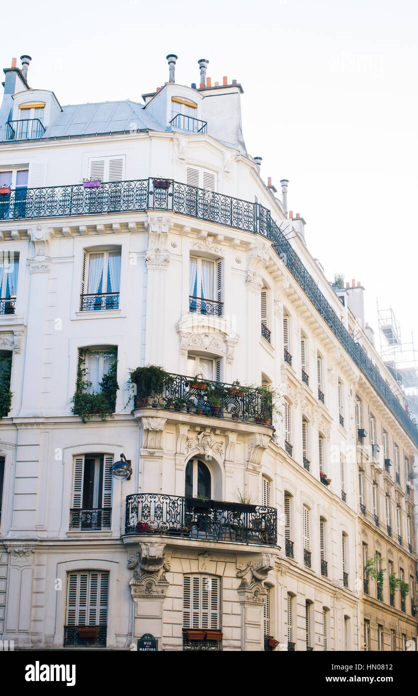 Facade of a typical building in Paris, France, with balconies in a ...