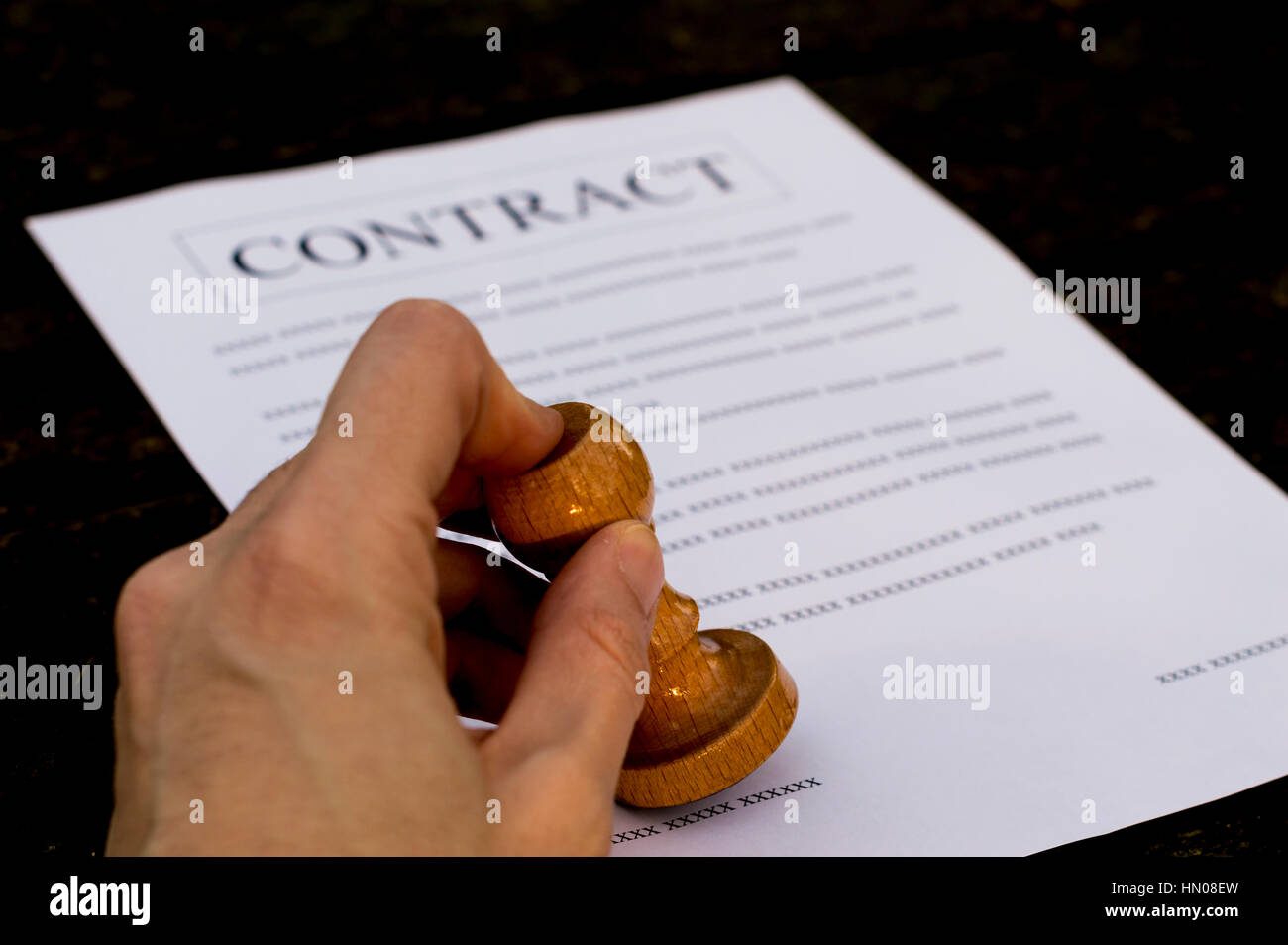 The man signs the document hi-res stock photography and images - Alamy
