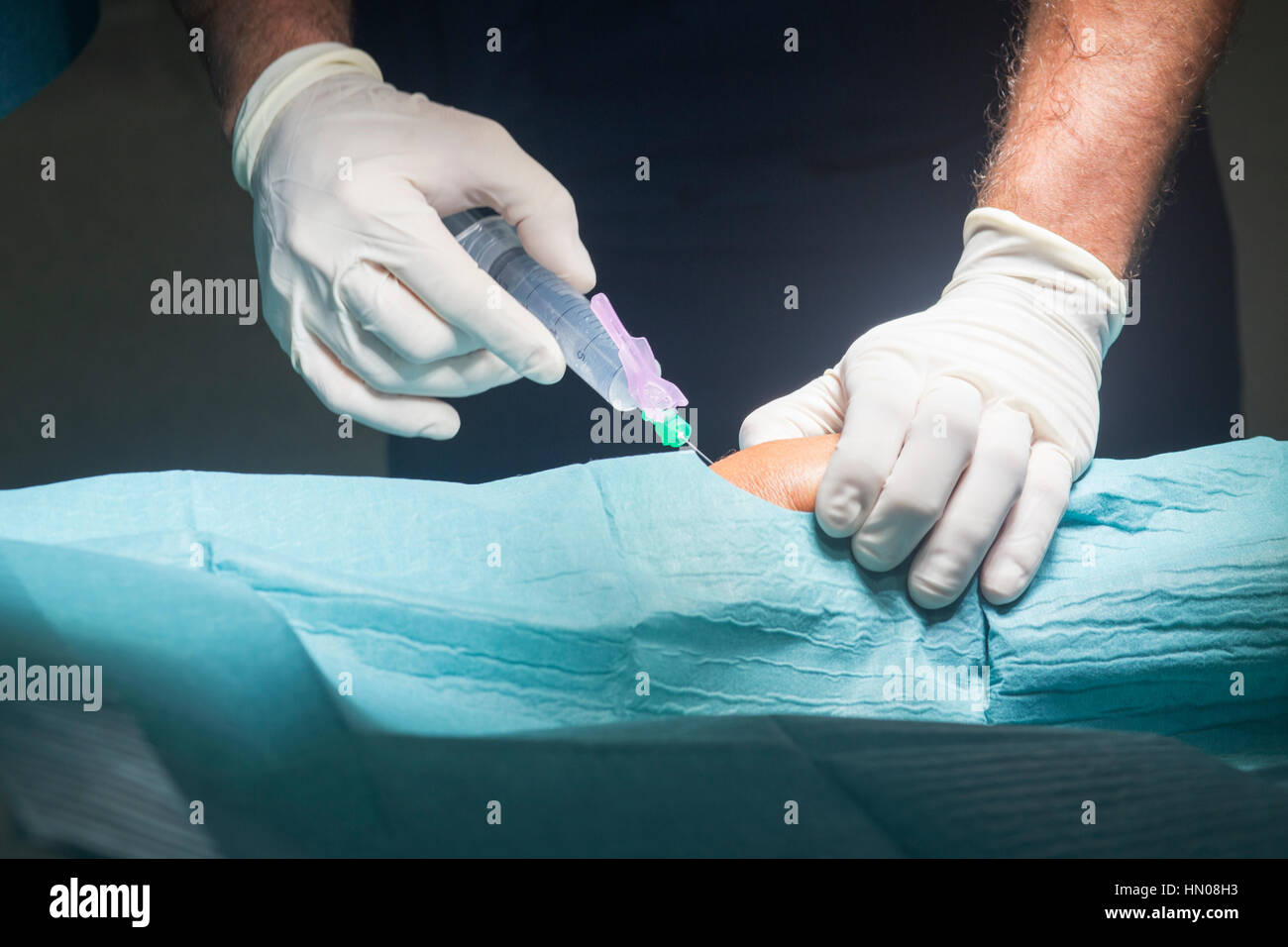 Anaesthtist anaesthetic injection in knee for surgery hospital ...