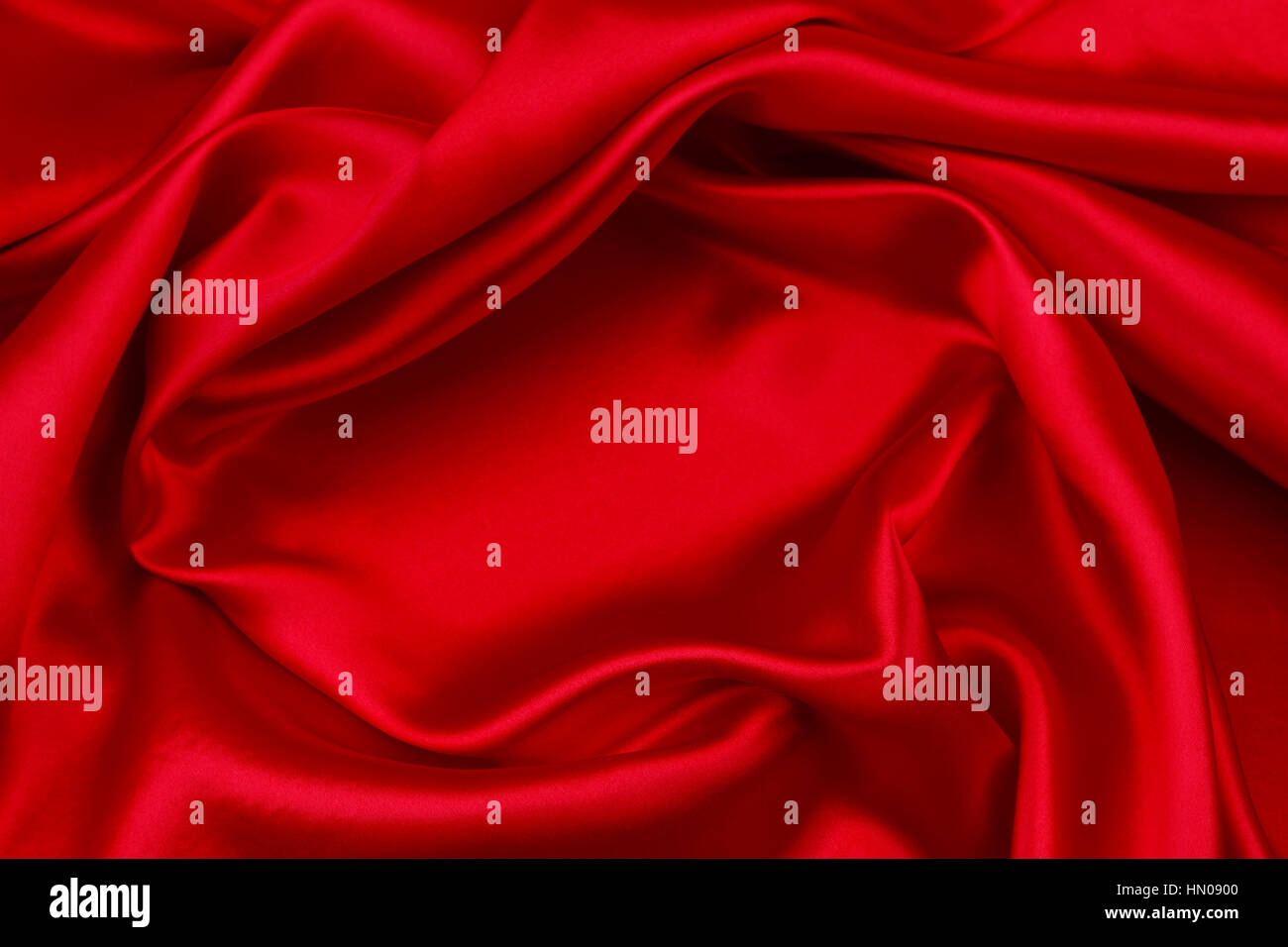 Closeup of ripples in red silk fabric Stock Photo - Alamy