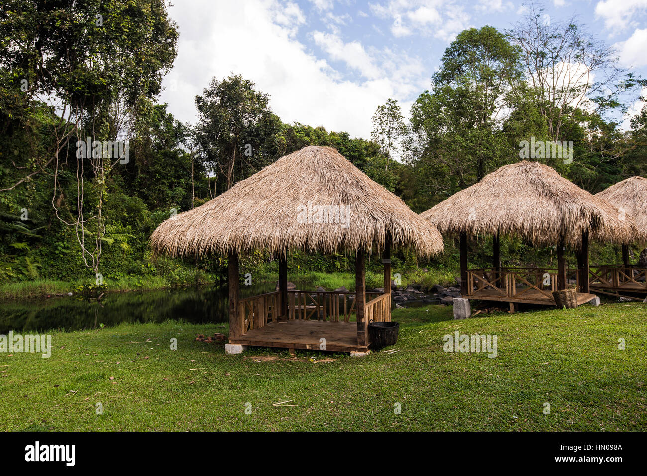 Nature wooden houses huts in a Asia vietnam Stock Photo - Alamy