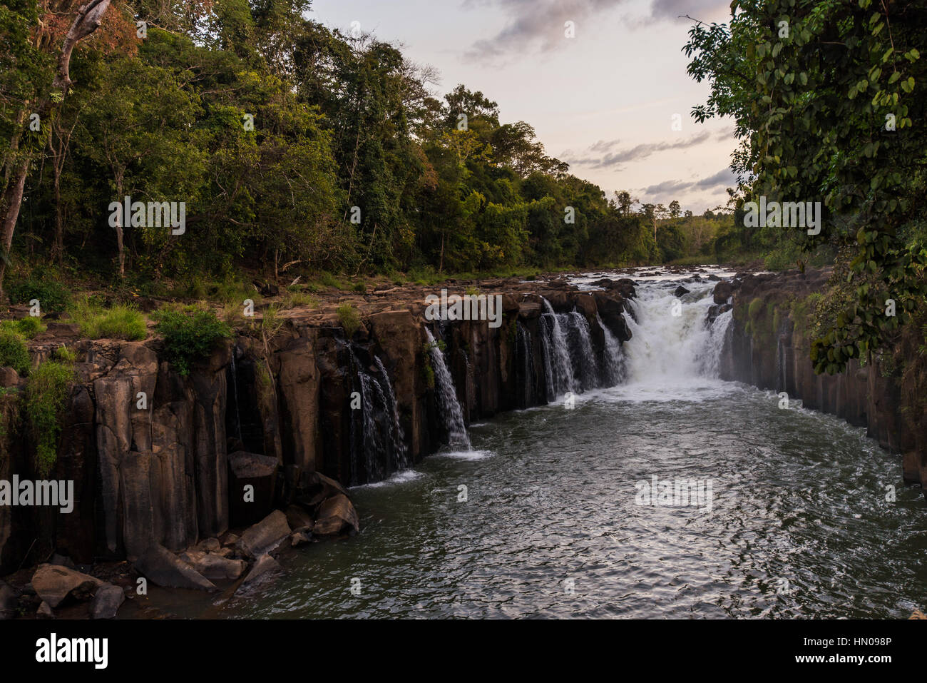waterfall in deep forest at Pakse Laos Stock Photo - Alamy