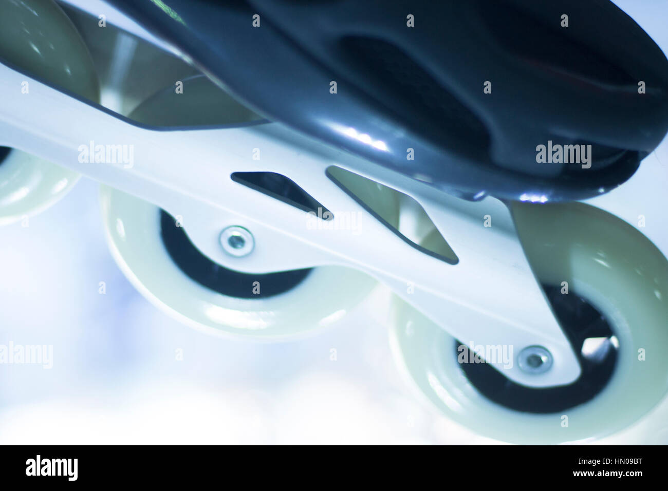 Freestyle inline skates boots and wheels in retail store shop window ...