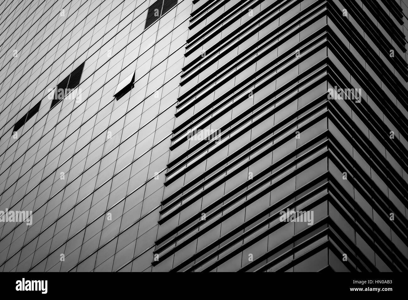 Windows of commercial building in Hong Kong with B&W color Stock Photo ...
