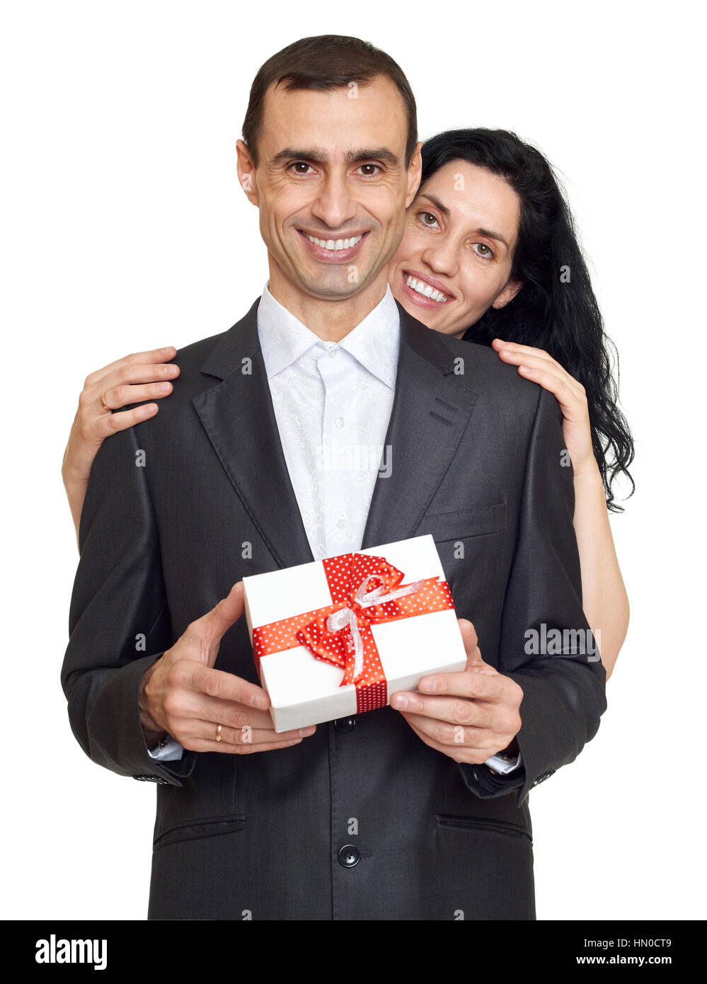 romantic couple with gift box, people dressed in black suit, beautiful ...