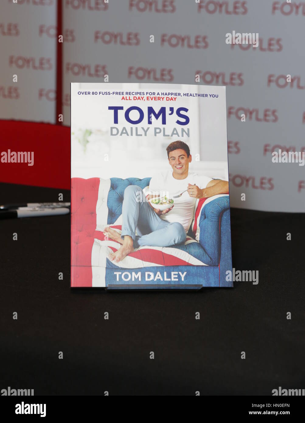 Gold medal-winning British diver Tom Daley, signs copies of his new ...