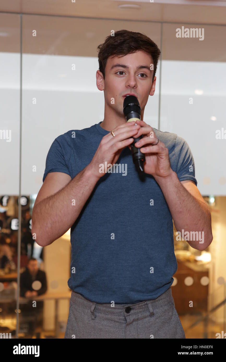 Gold medal-winning British diver Tom Daley, signs copies of his new ...