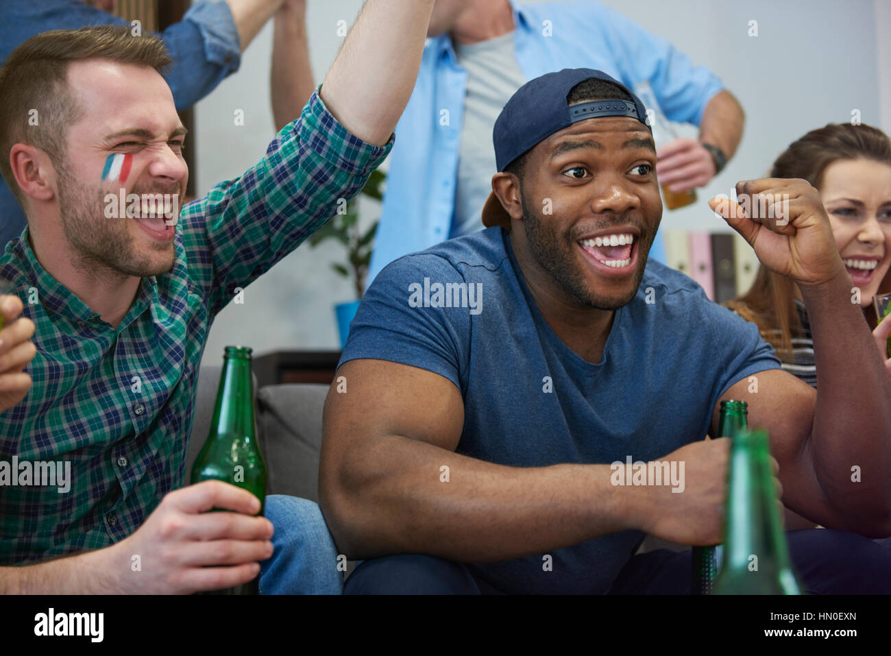 Great emotions of group of friends Stock Photo - Alamy