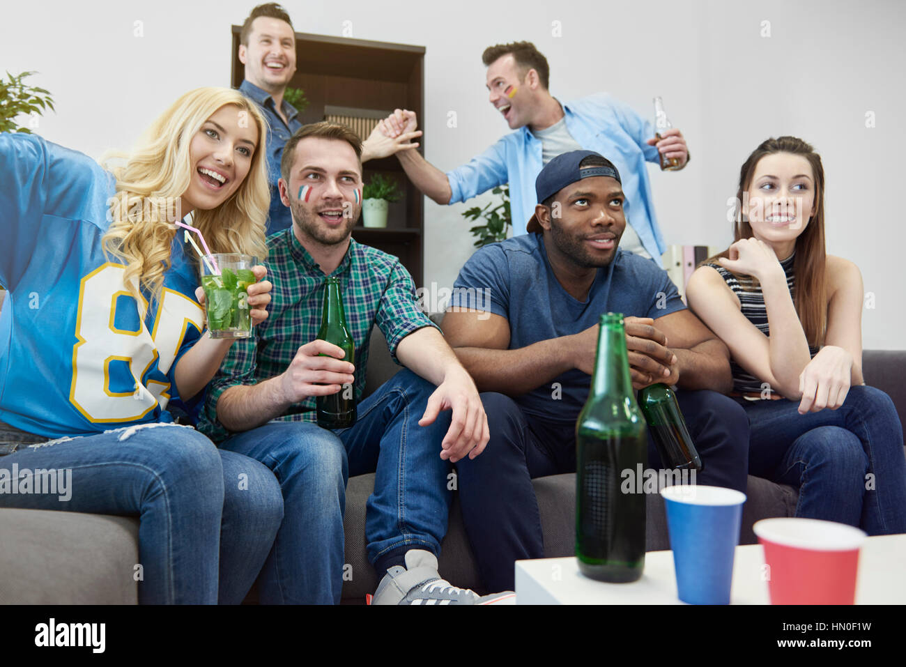Party with friends during championships Stock Photo - Alamy