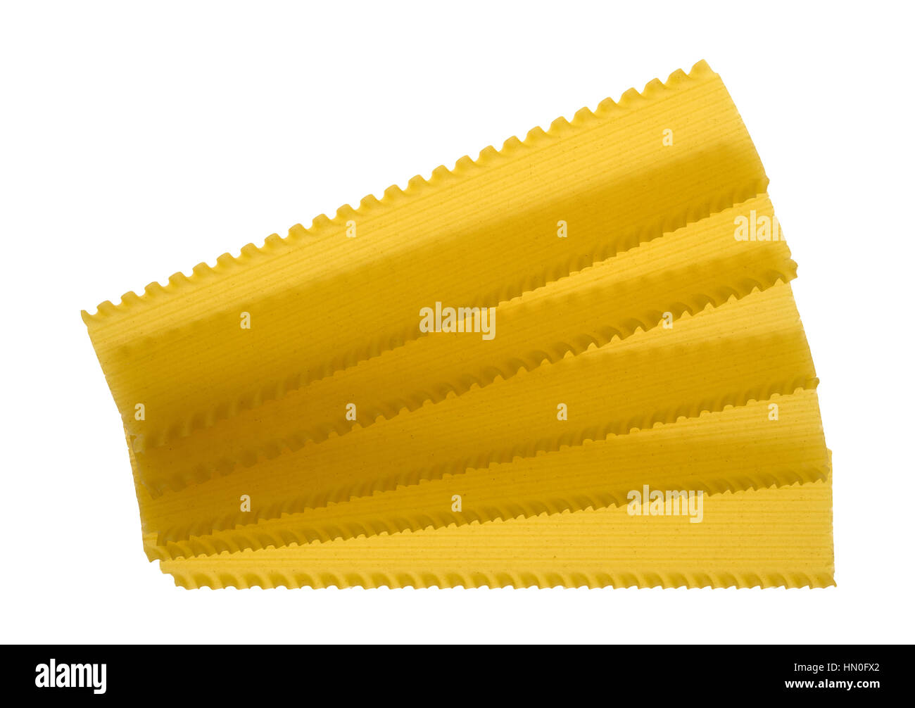 Top view of several strips of uncooked lasagna spread out isolated on a ...