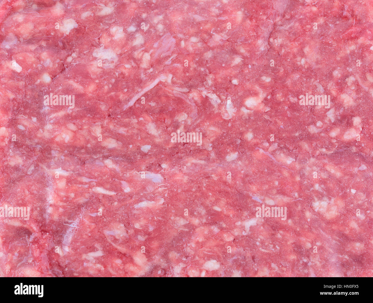 A very close view of lean ground packaged beef Stock Photo - Alamy