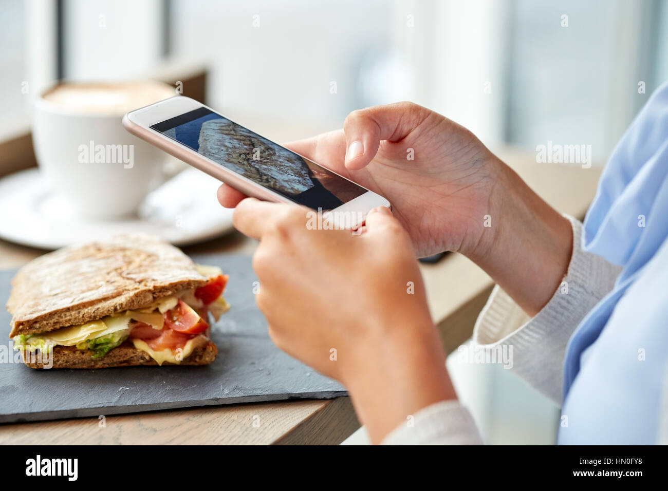 hands with smartphone photographing food Stock Photo - Alamy