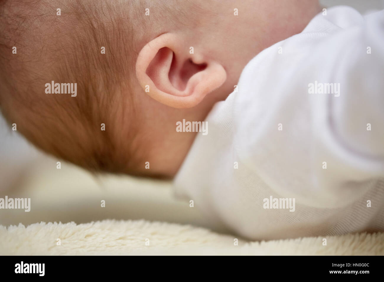 Kid ear hi-res stock photography and images - Alamy