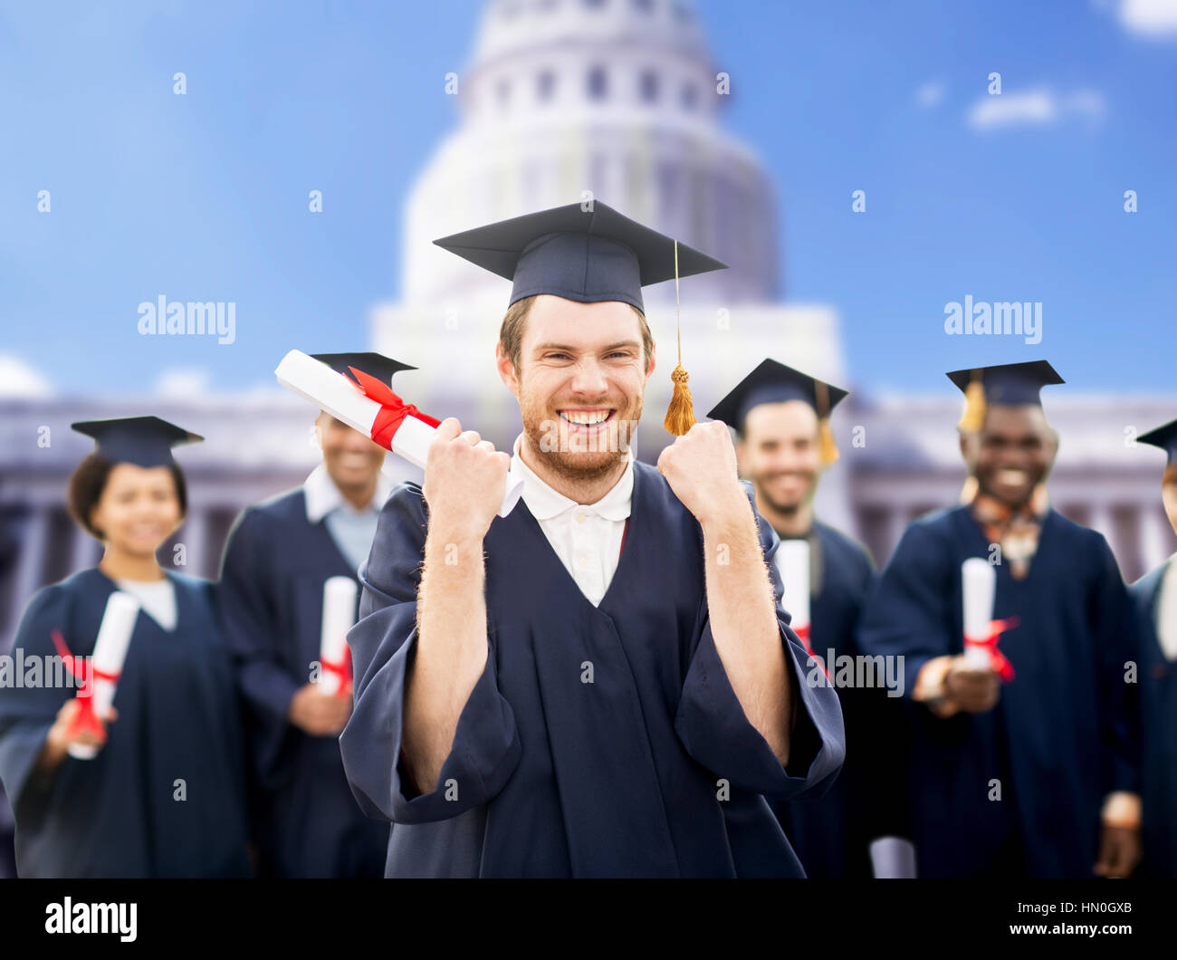 happy student with diploma celebrating graduation Stock Photo - Alamy