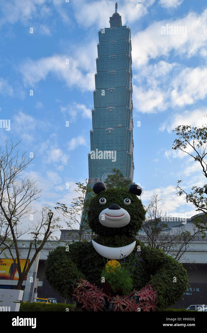 A florally arranged 2017 Universiade mascot outside Taipei 101 ...