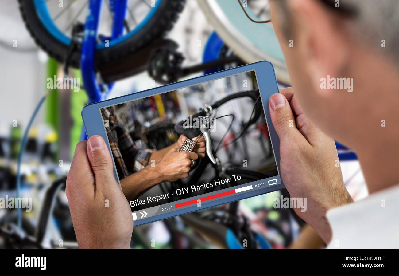 Fast forward sign on digitally generated blank screen against man using ...