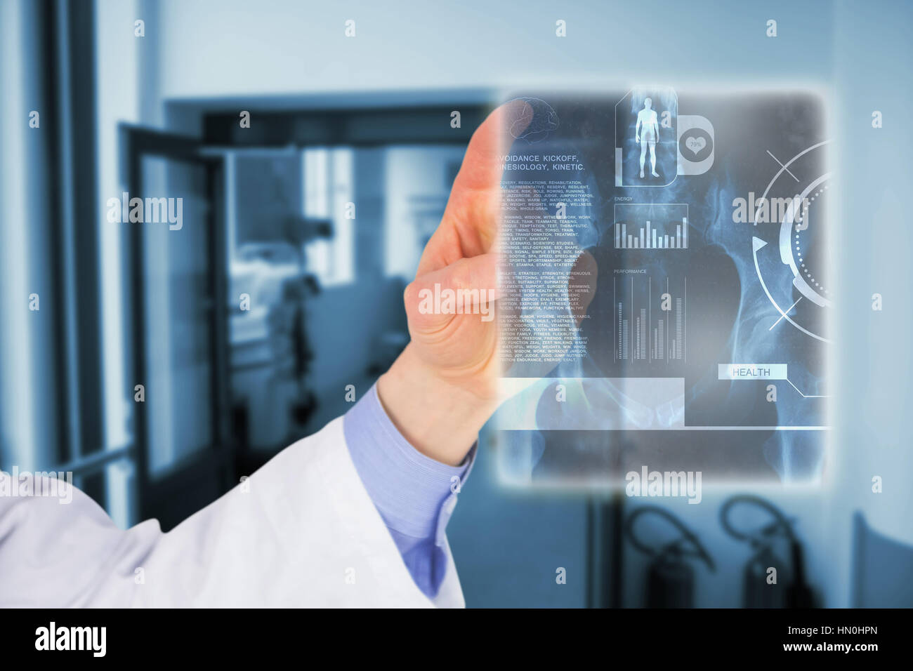 Cropped image of male doctor touching screen against view of hospital ...