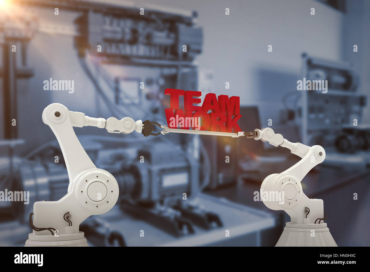 Mechanical hands holding red team work message on white background ...