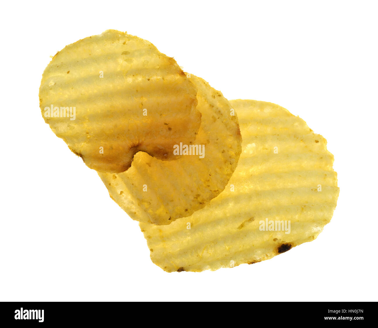 Top view of three wavy potato chips isolated on a white background ...