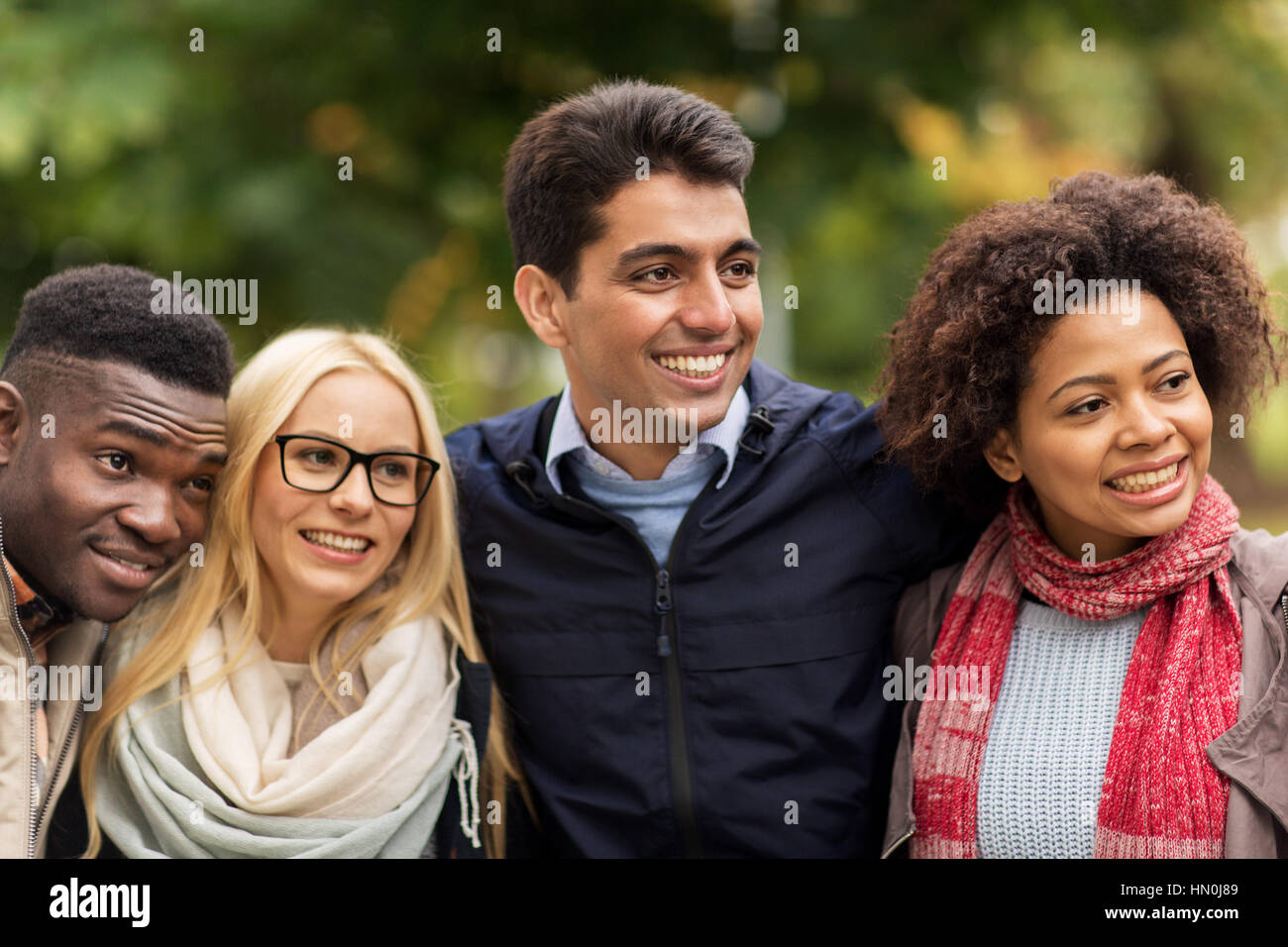 group of happy international friends outdoors Stock Photo - Alamy