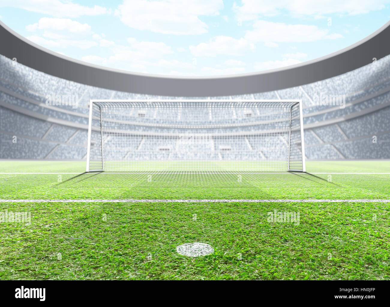 A generic seated soccer stadium showing a set of goals and penalty spot ...