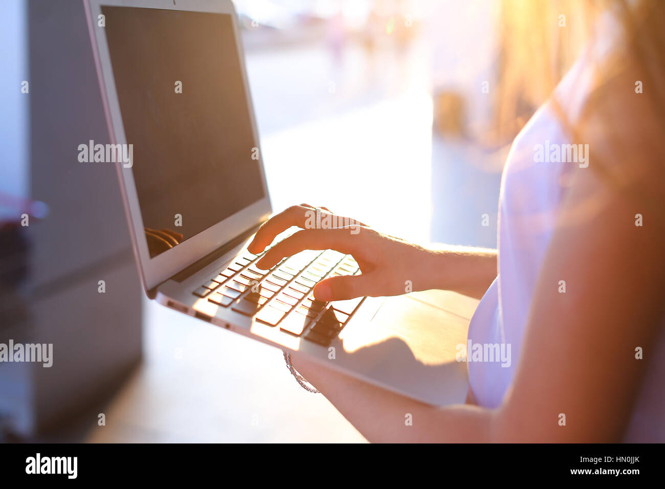 Hand lady press tauchpad keyboard on laptop. Young beautiful female ...