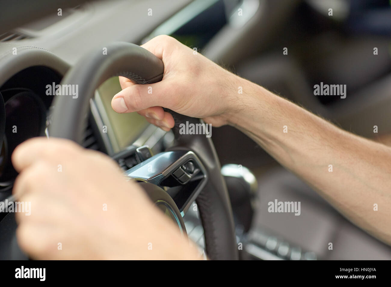 Hands man driving car close hi-res stock photography and images - Alamy