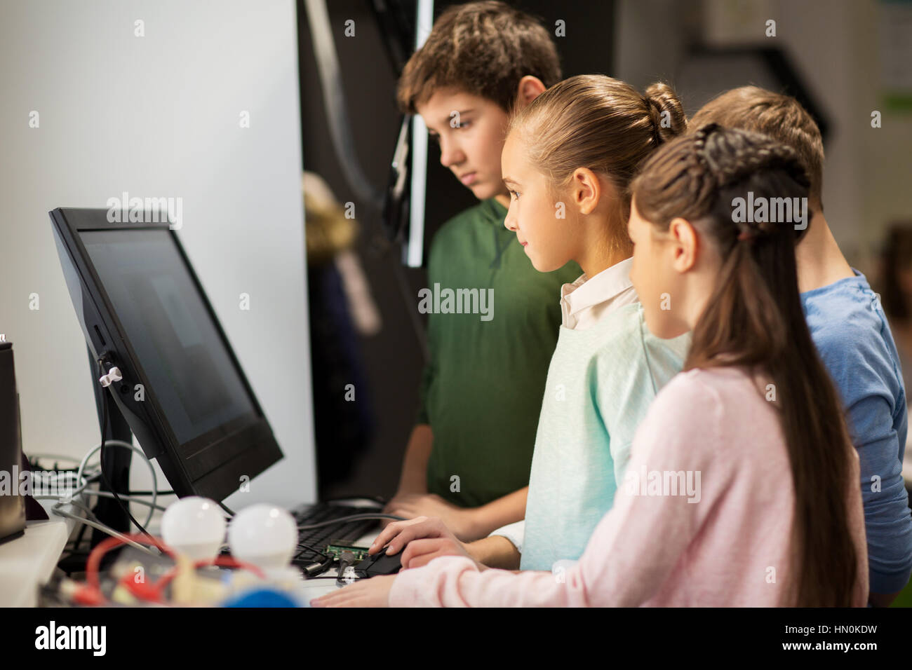happy children with computer at robotics school Stock Photo - Alamy