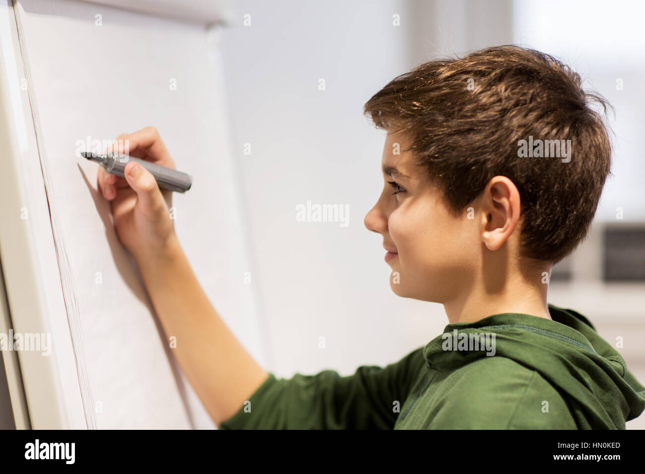 Child school board writing hi-res stock photography and images - Alamy