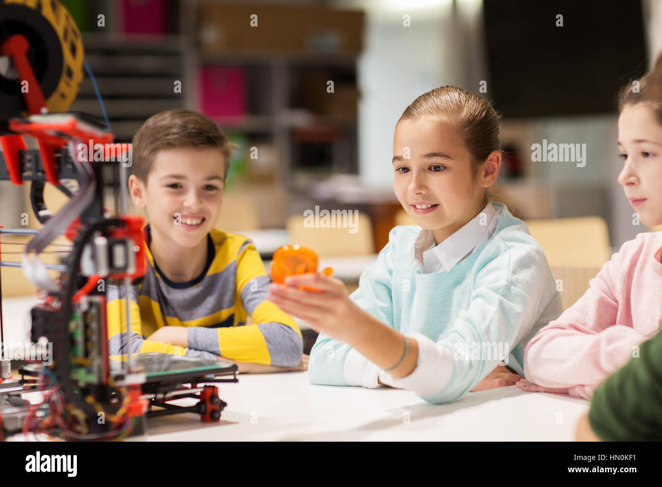 happy children with 3d printer at robotics school Stock Photo - Alamy