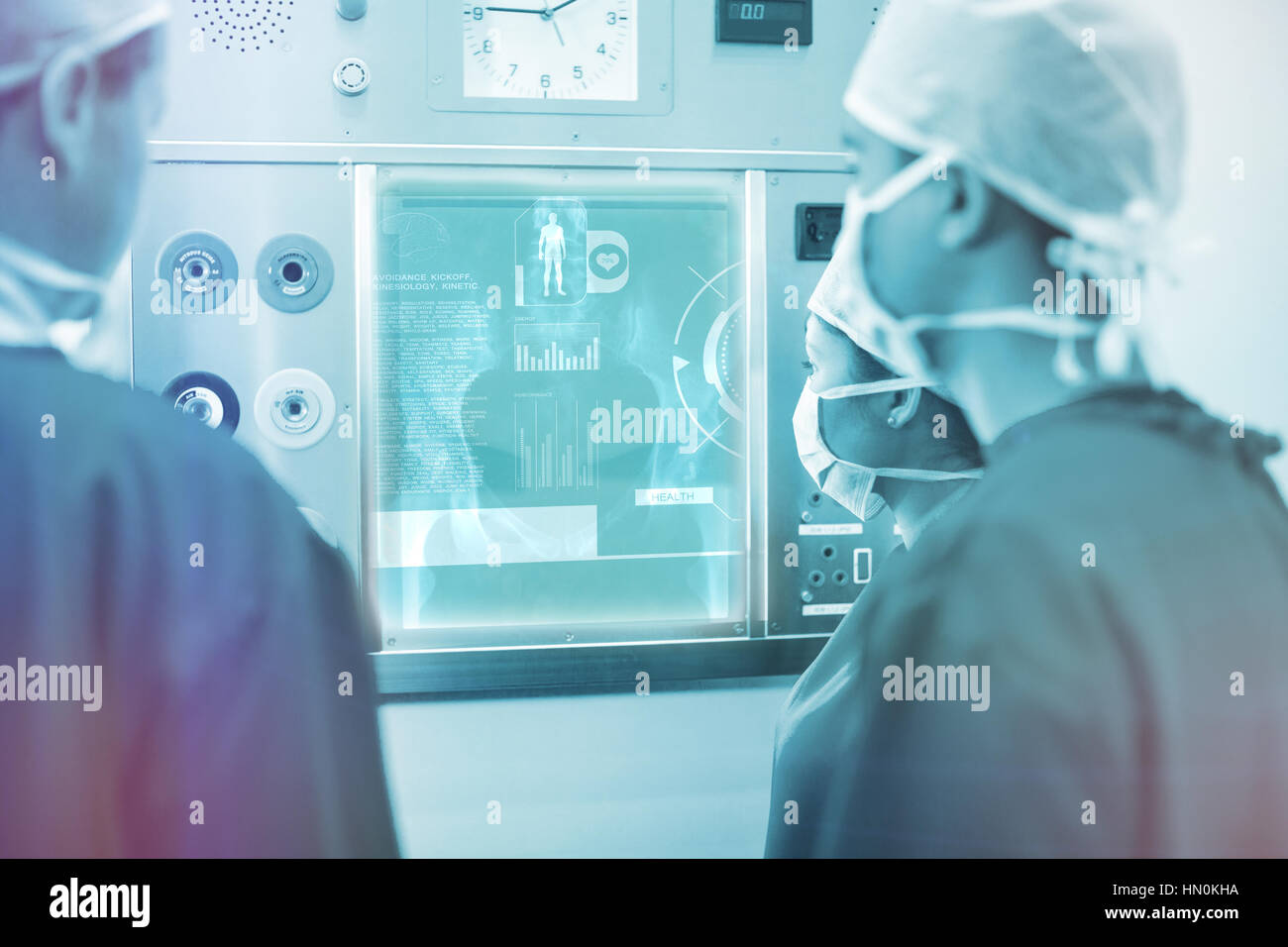 Medical interface on xray against surgeons discussing report on ...