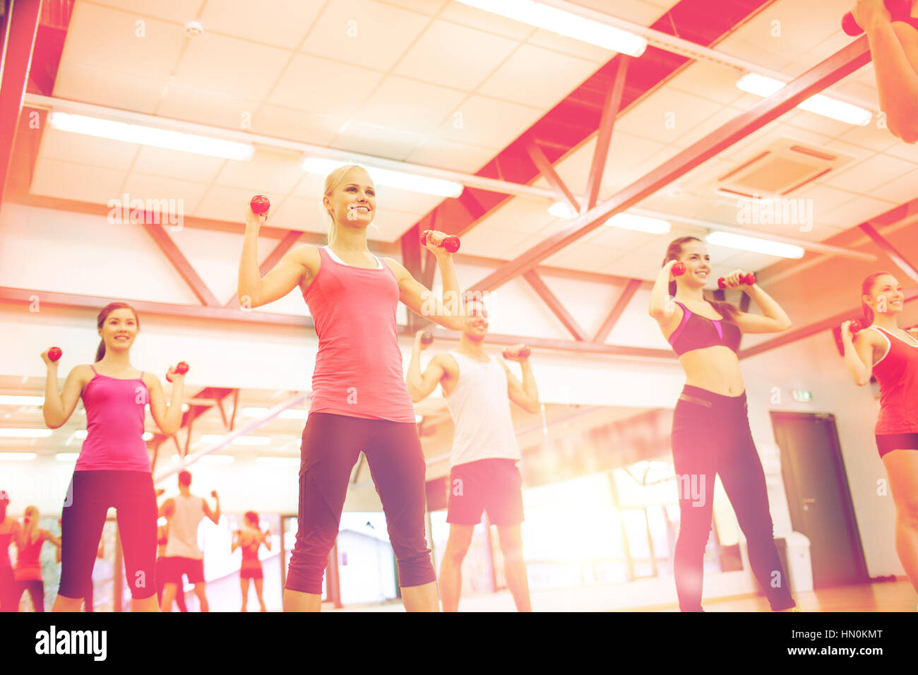 group of people working out with dumbbells Stock Photo - Alamy