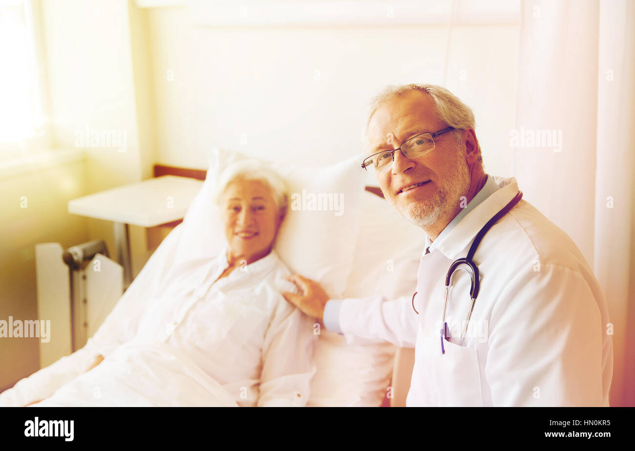 doctor visiting senior woman at hospital ward Stock Photo - Alamy