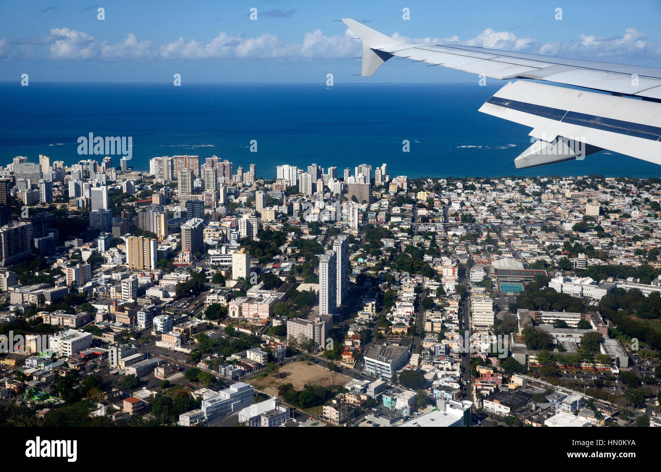 City view, Plane landing at Luis Munoz Marin International in San Juan ...