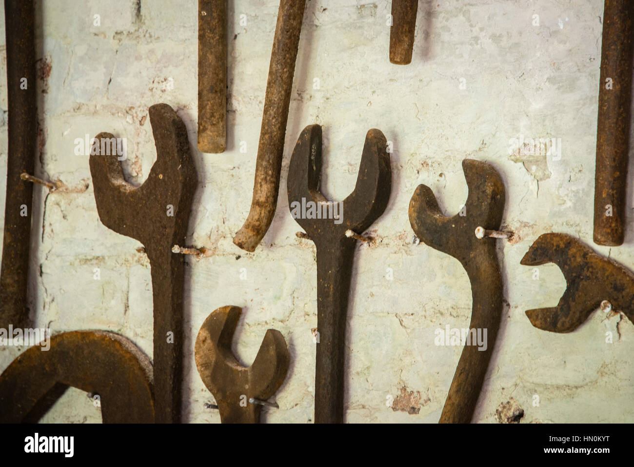 Rusty spanners on a wall in a museum in the UK Stock Photo - Alamy