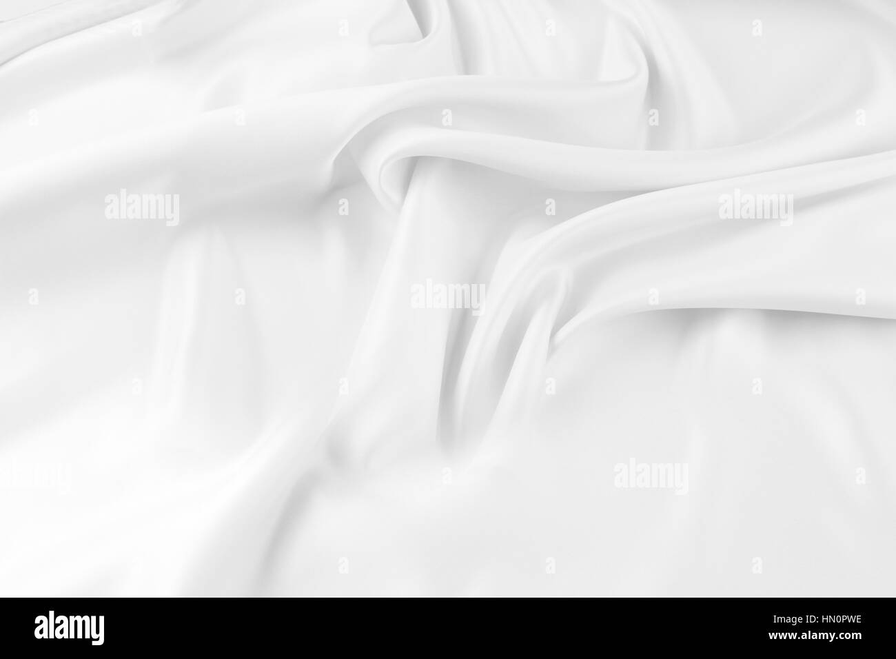 Closeup of rippled white silk fabric Stock Photo - Alamy