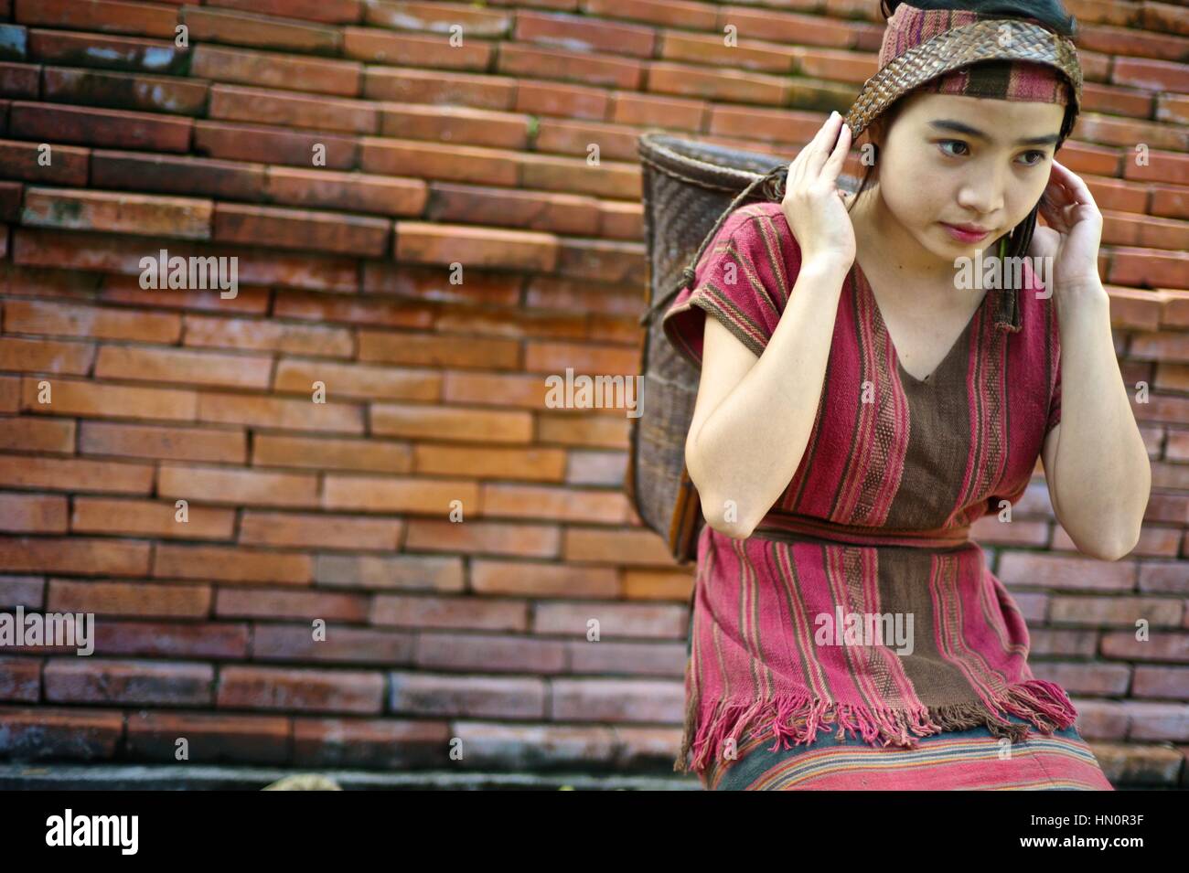 Teen girl wearing a Khmu country side traditional dress in Laos. Name ...