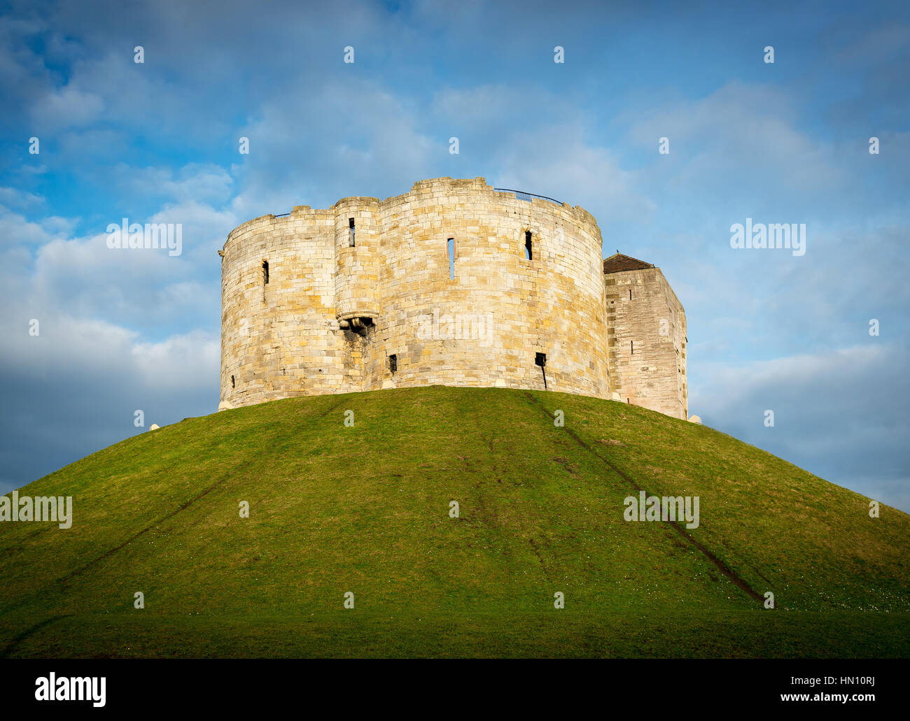 Small castle on a hill in a small town Stock Photo - Alamy