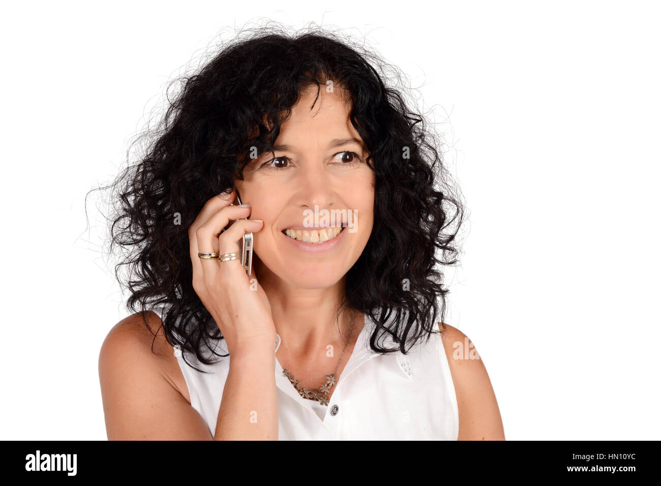Portrait of beautiful woman talking on phone. Isolated white background ...