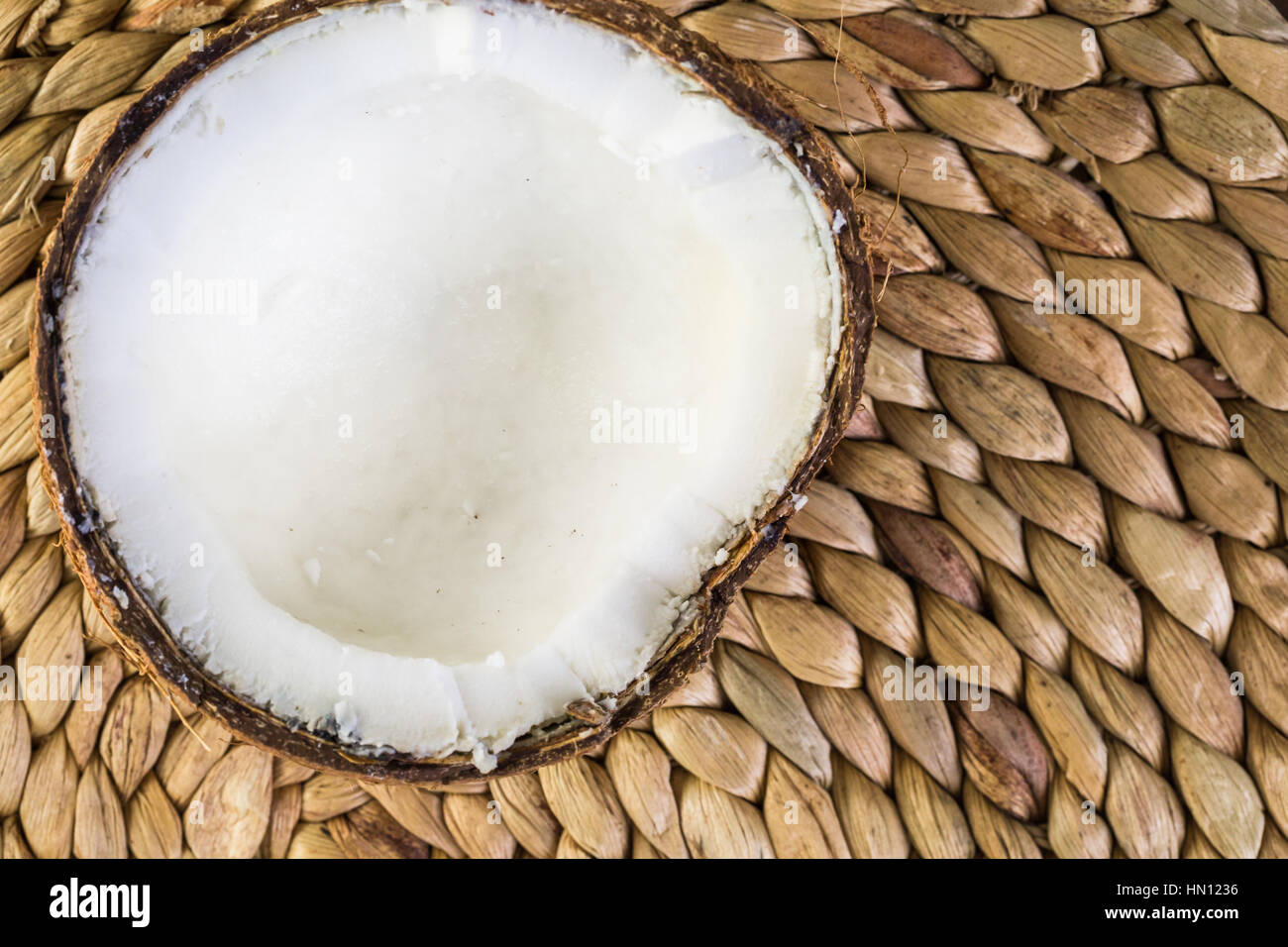 fresh opened coconut on the table Stock Photo - Alamy