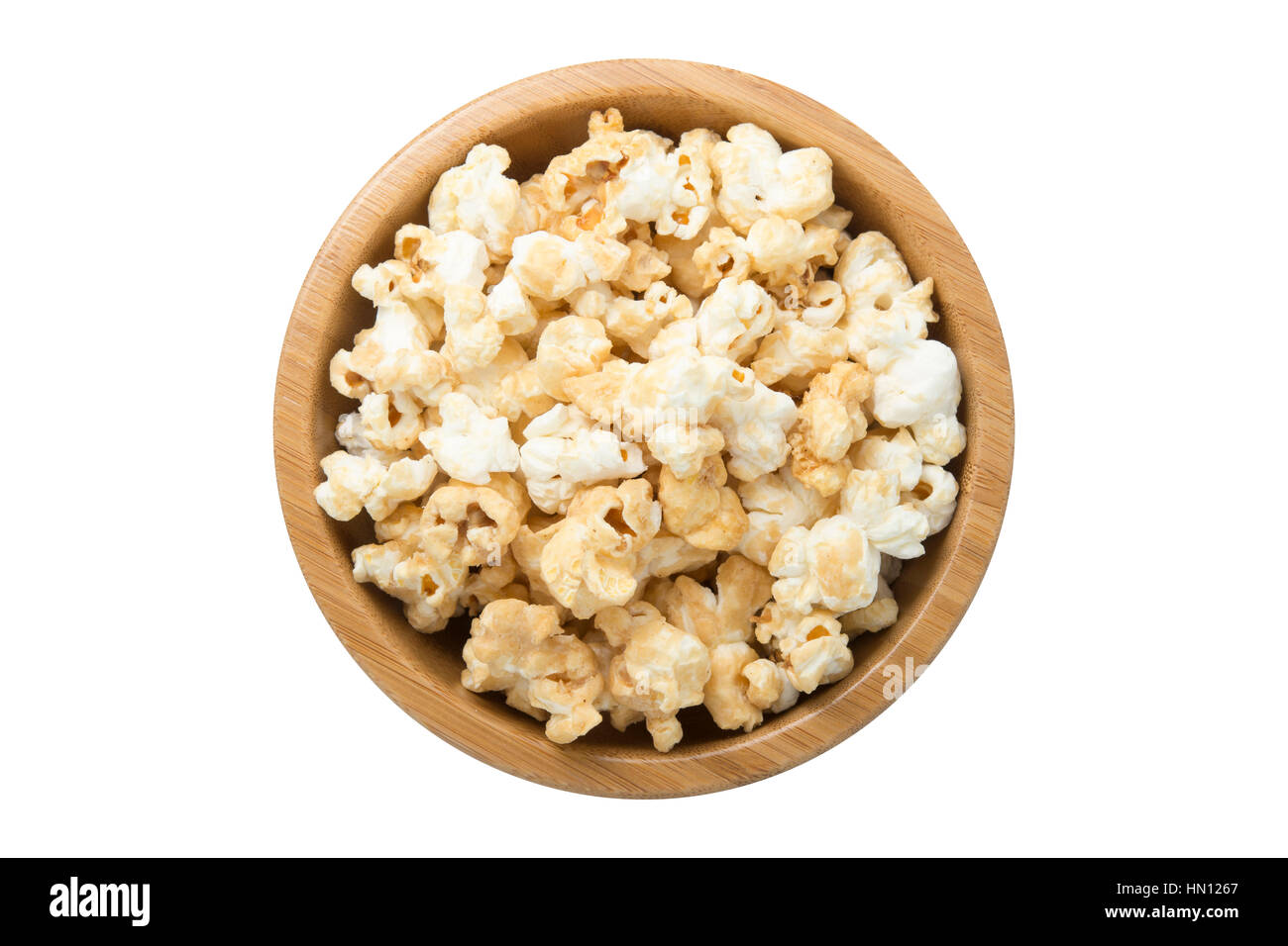 Top view of popcorn in wooden bowl isolated on white background with ...