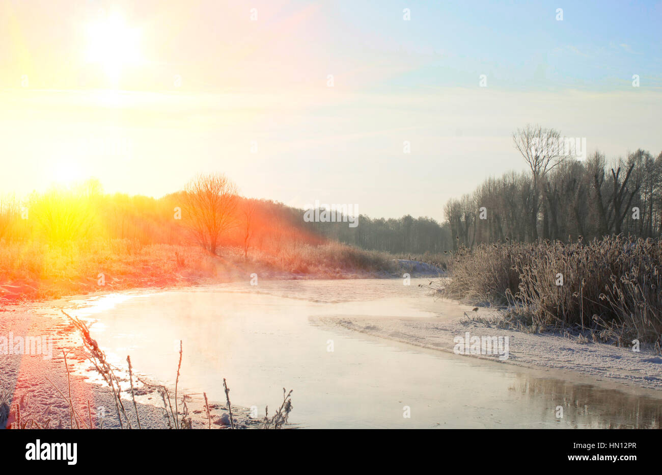snowy winter sunset in the city Stock Photo - Alamy