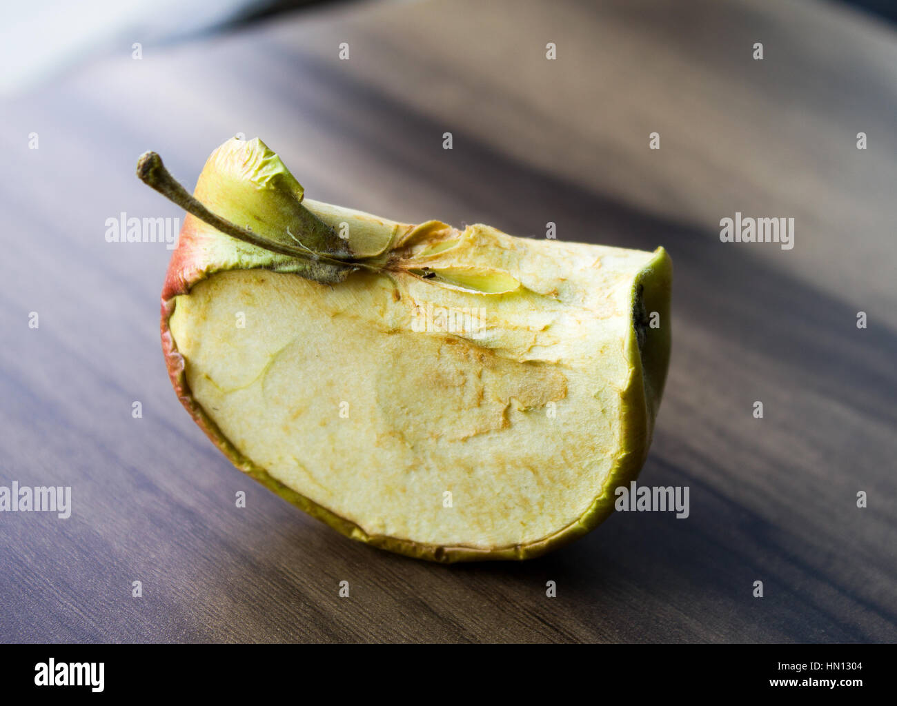 the dried-up apple on a wooden board, can be used for design Stock ...