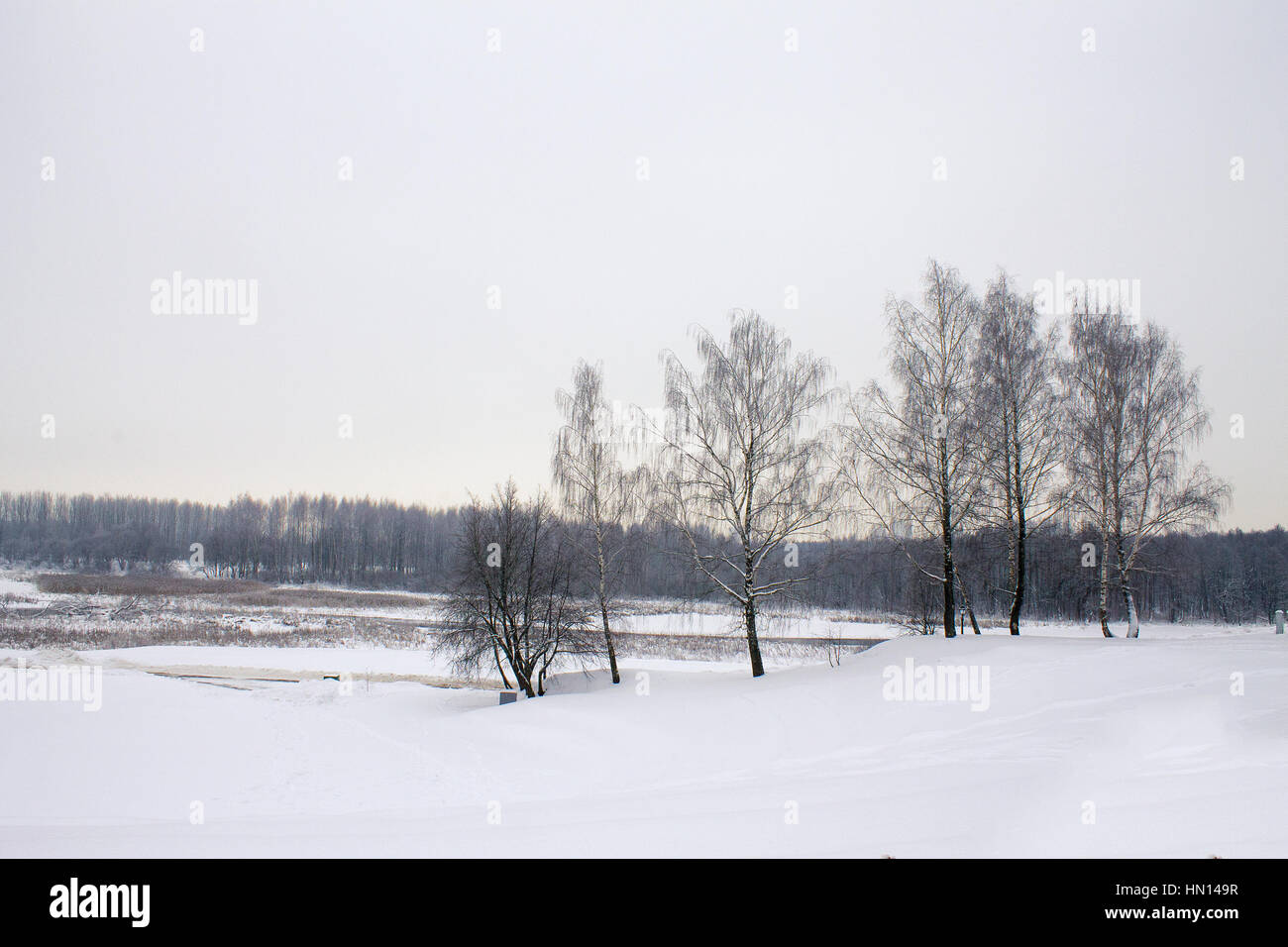 snowy winter sunset in the city, the background Stock Photo - Alamy