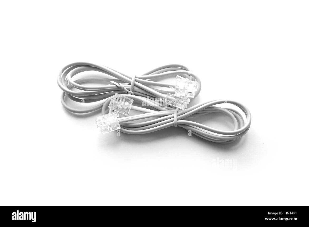 Closed up telephone cable (RJ-11) on white background Stock Photo - Alamy