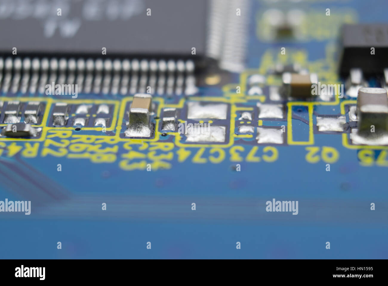 Close up of printed circuit board with big microchip and other ...