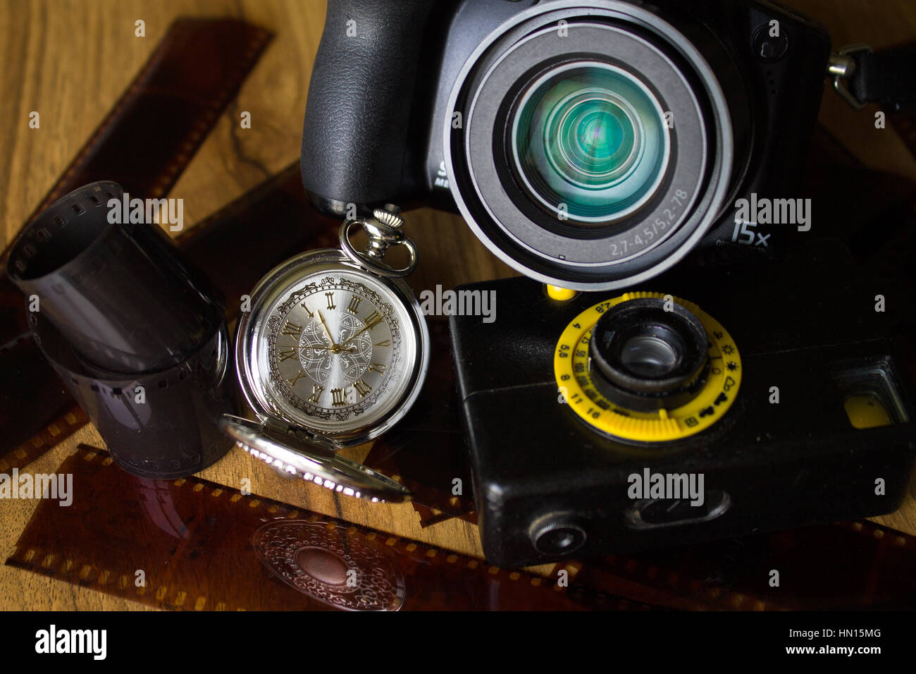 retro camera and pocket watch, concept design Stock Photo - Alamy