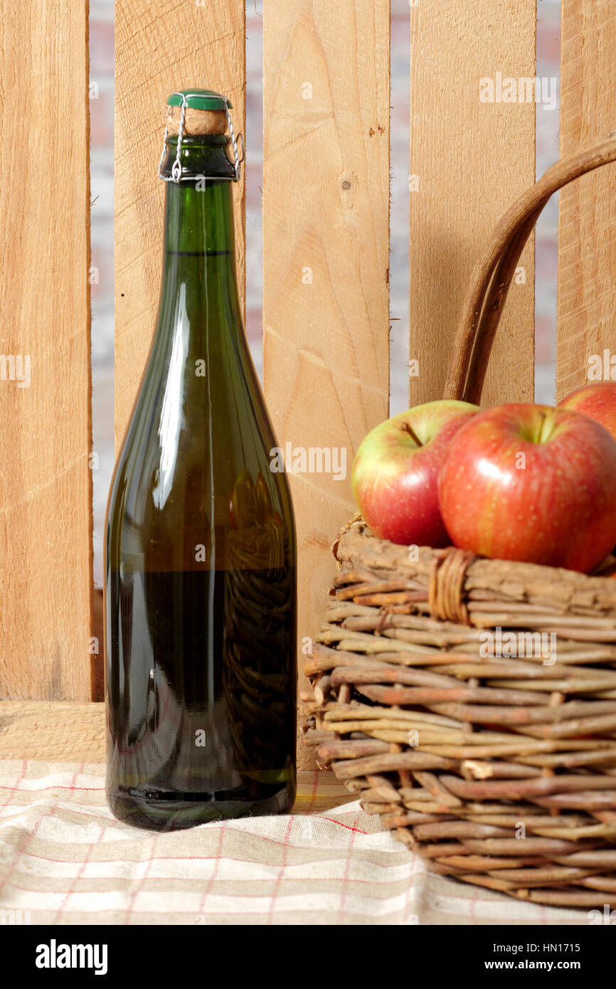 bottle of cider of Normandy with fresh apples Stock Photo - Alamy