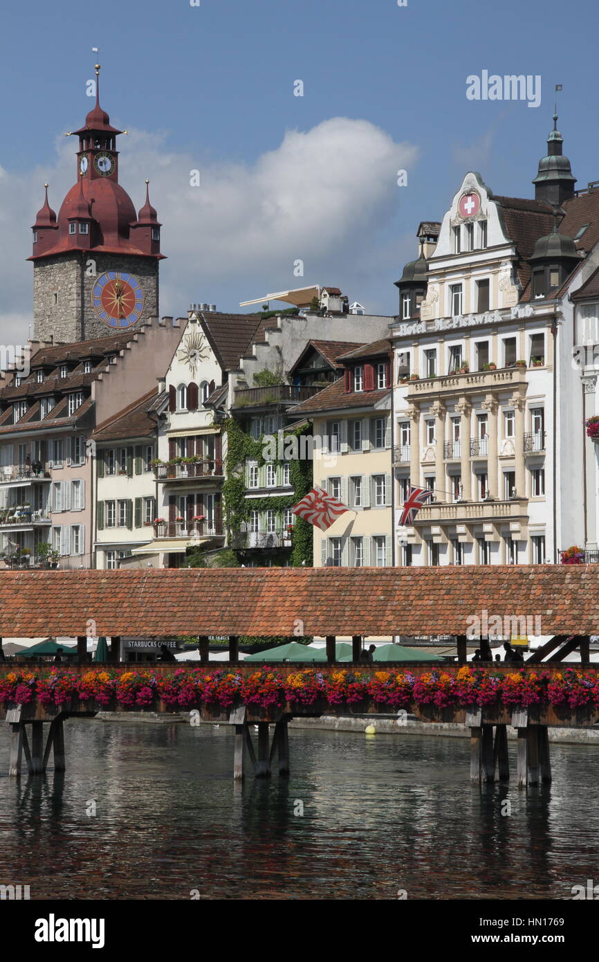 The Kapellbrucke (Chapel Bridge) in Lucerne Switzerland with town hall ...